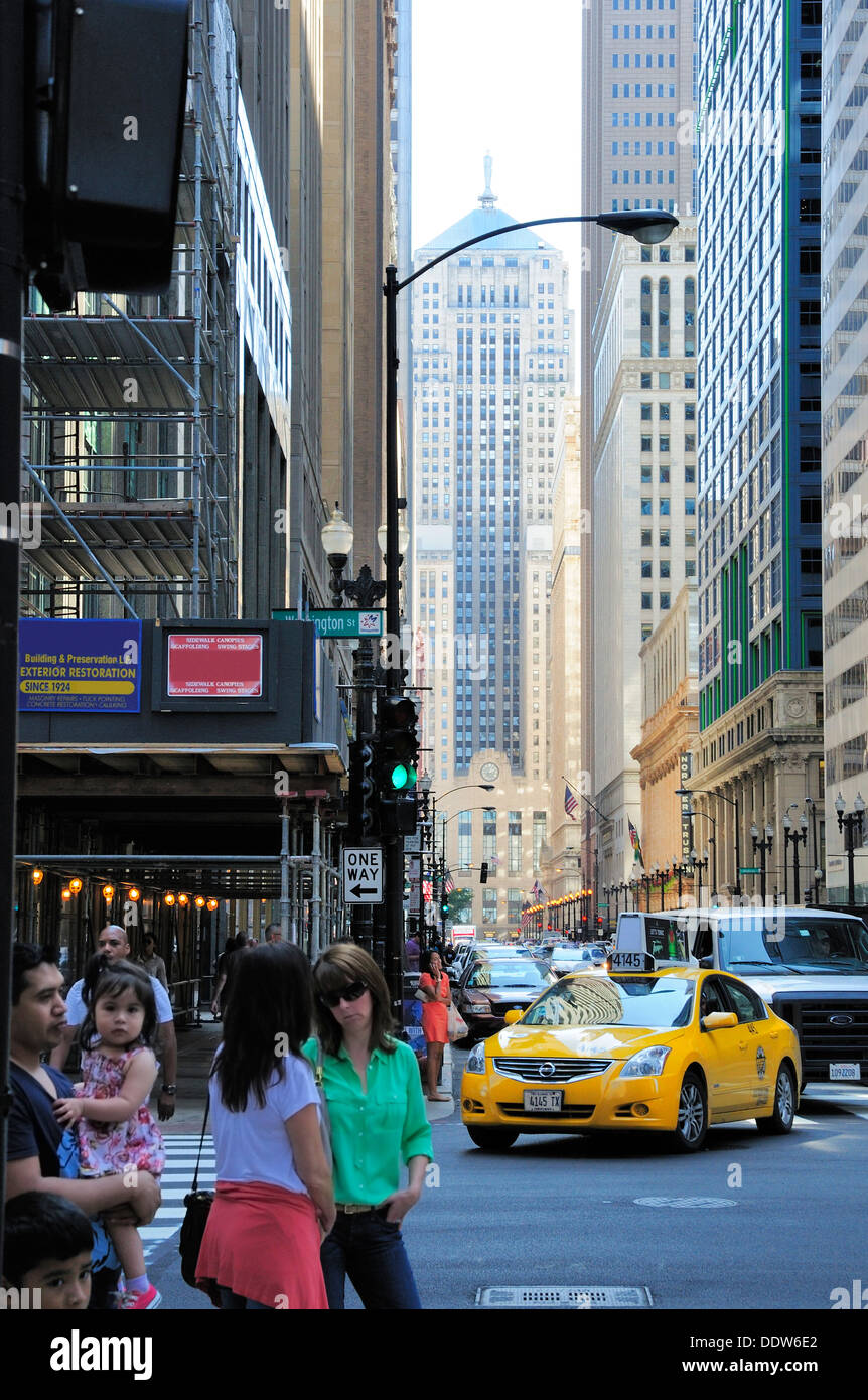 Two women waiting for stop light to change. View south of La Salle St ...