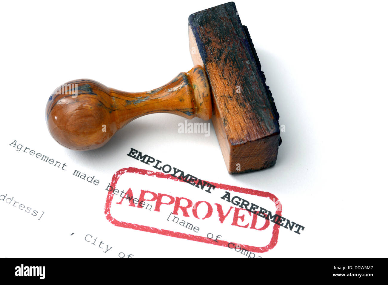Employment agreement approved with stamp on white paper Stock Photo - Alamy