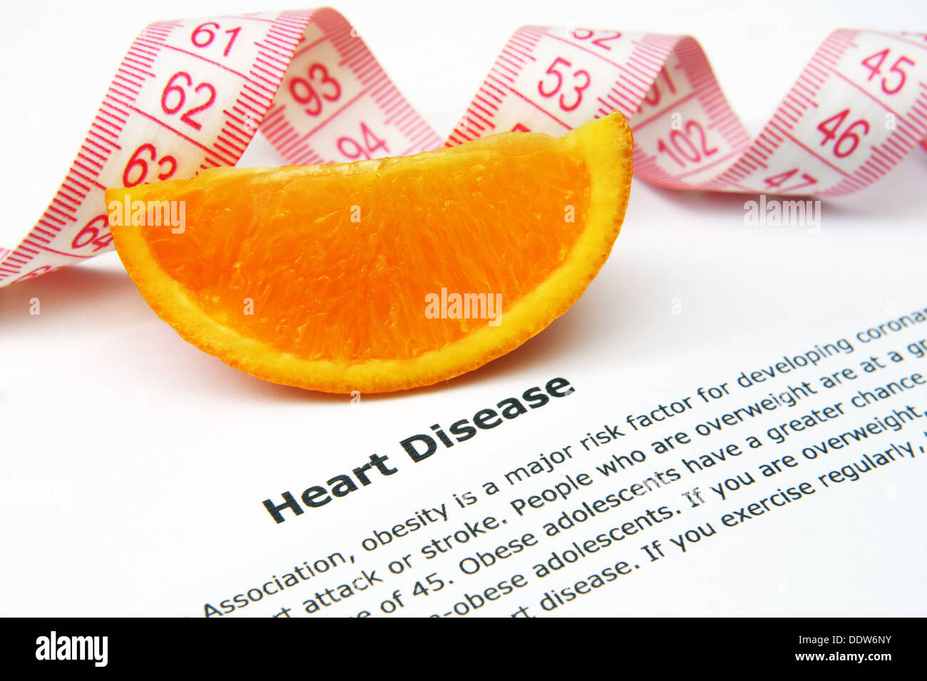 Heart disease text on white paper Stock Photo - Alamy