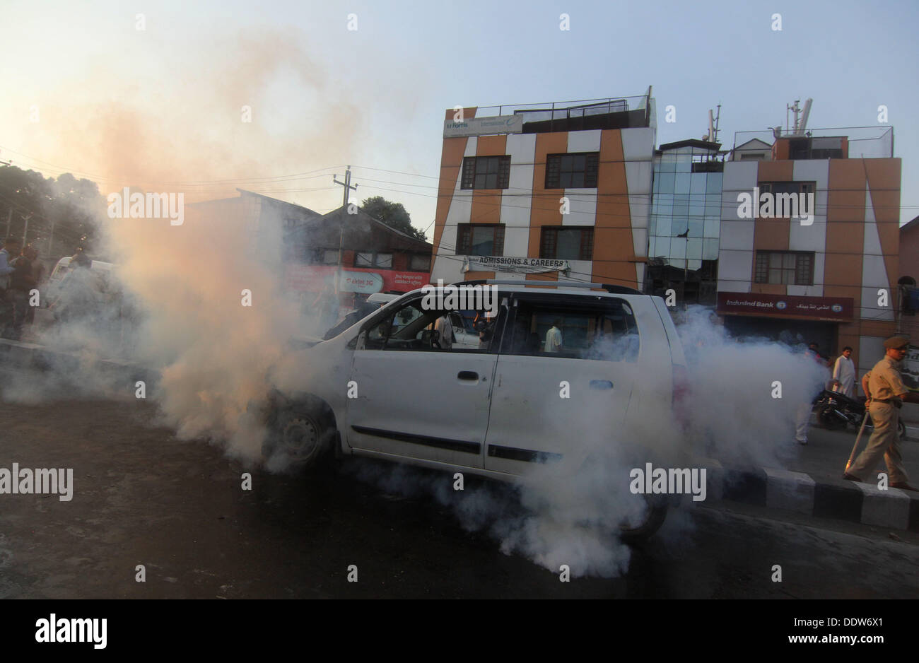 Firing tear gas smoke hi-res stock photography and images - Alamy