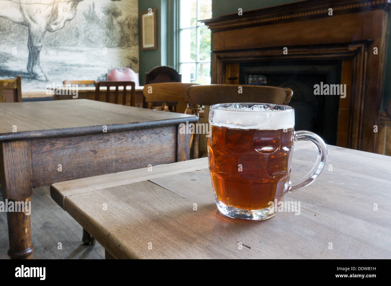 A pint mug of Hare Ale in the Hare and Billet pub at Blackheath, south ...