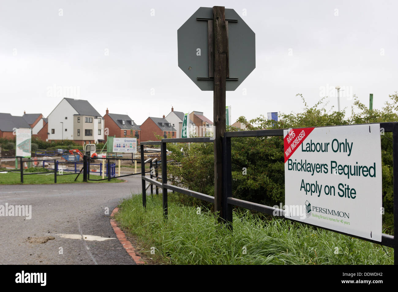 Labour required sign on house building site Stock Photo - Alamy