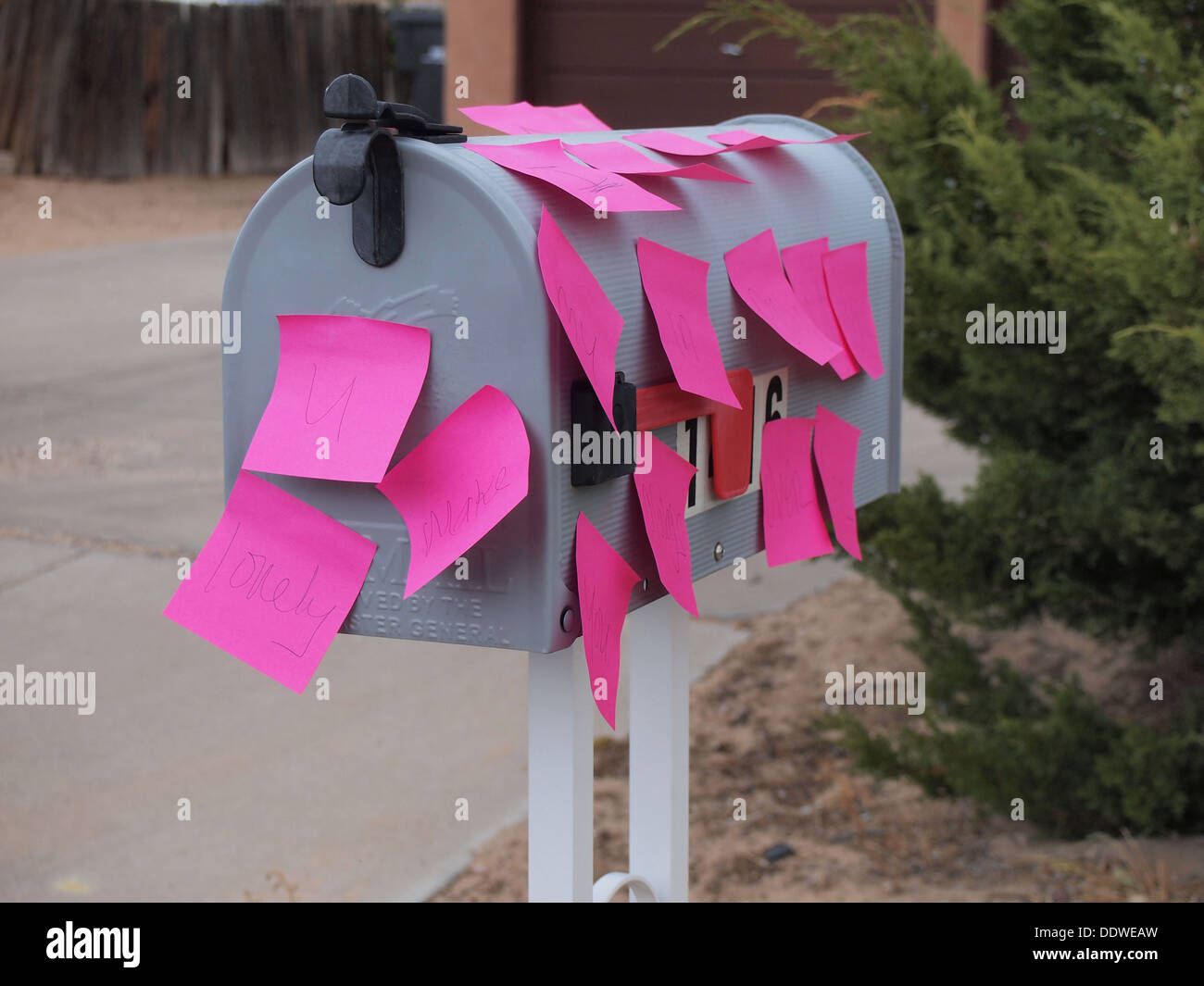 Using low tech messaging, someone has stuck many Post It notes to a ...