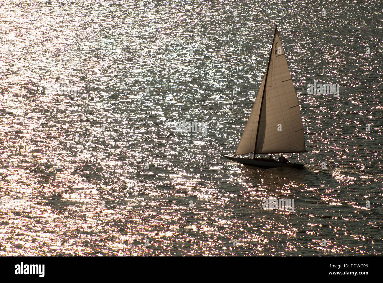 Sailboat in the afternoon sun Stock Photo - Alamy