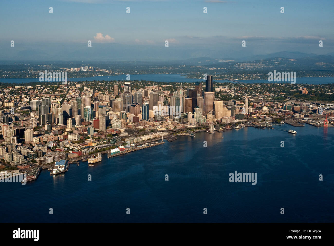 Aerial view of Seattle skyline with waterfront and ferry boat leaving ...
