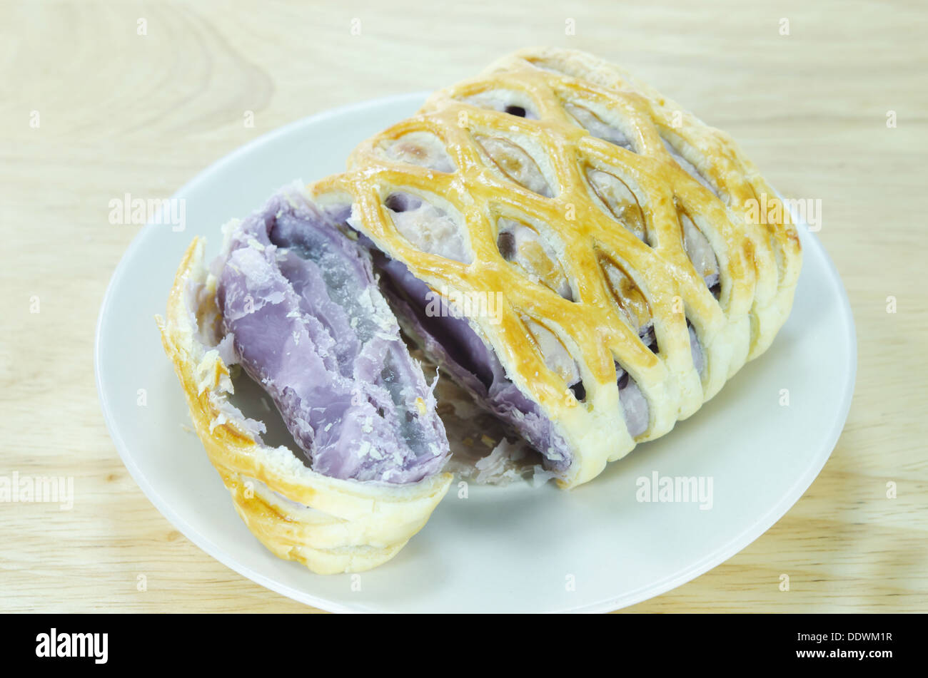 taro pies on wooden background with wooden spoon Stock Photo - Alamy