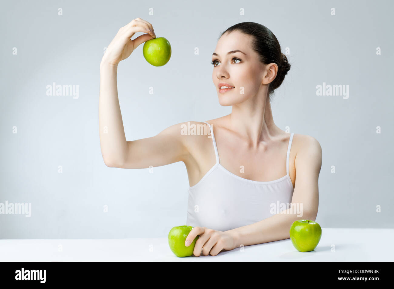 A beautiful slender girl eating healthy food Stock Photo - Alamy