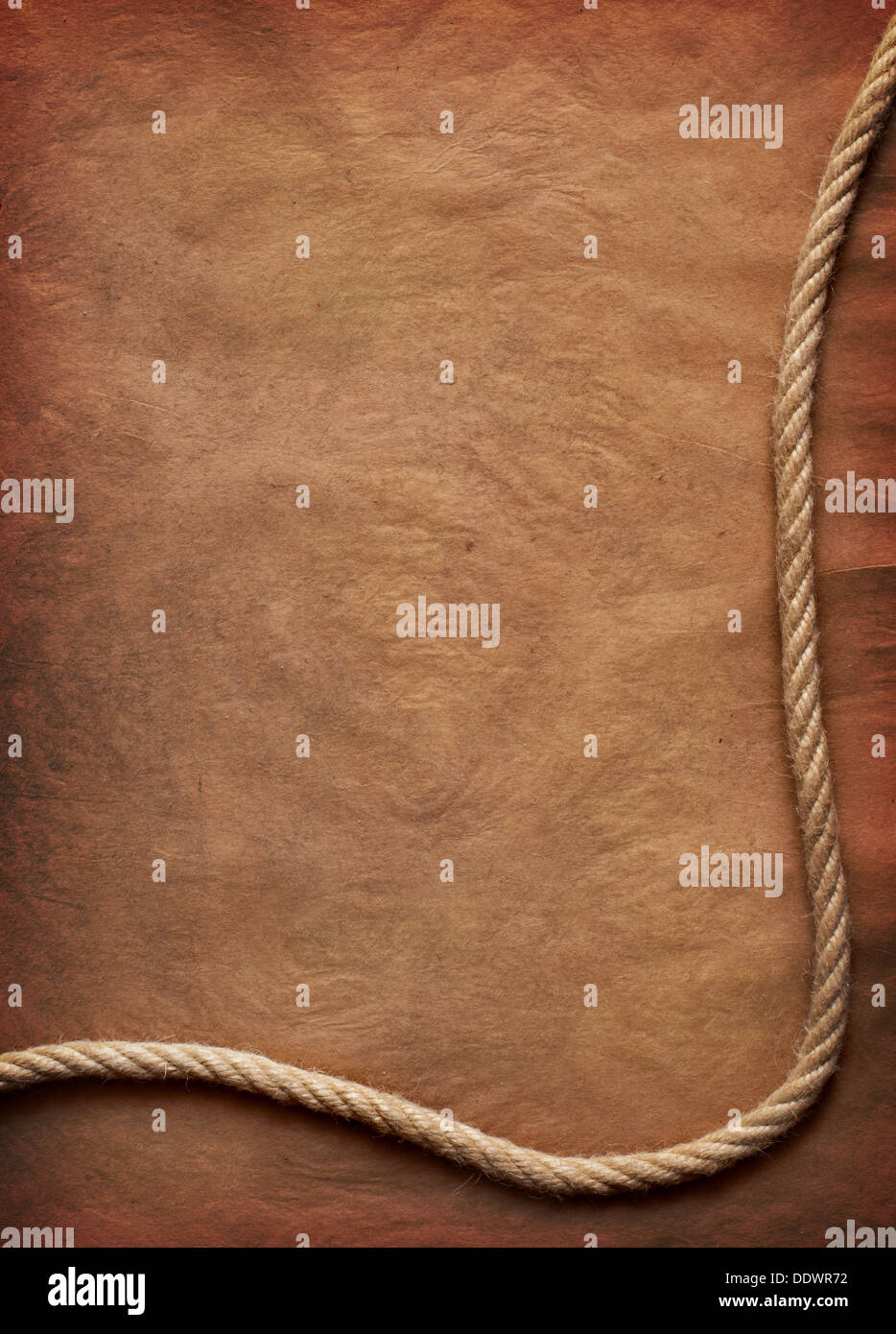 Aged Rope on the old paper background Stock Photo - Alamy