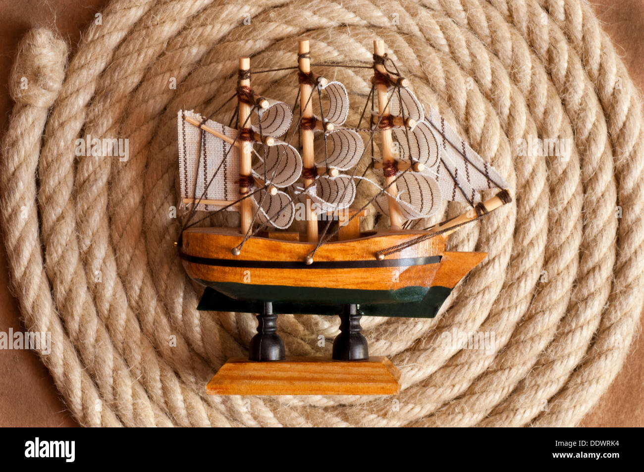 Aged Rope and ship on the old paper background Stock Photo - Alamy
