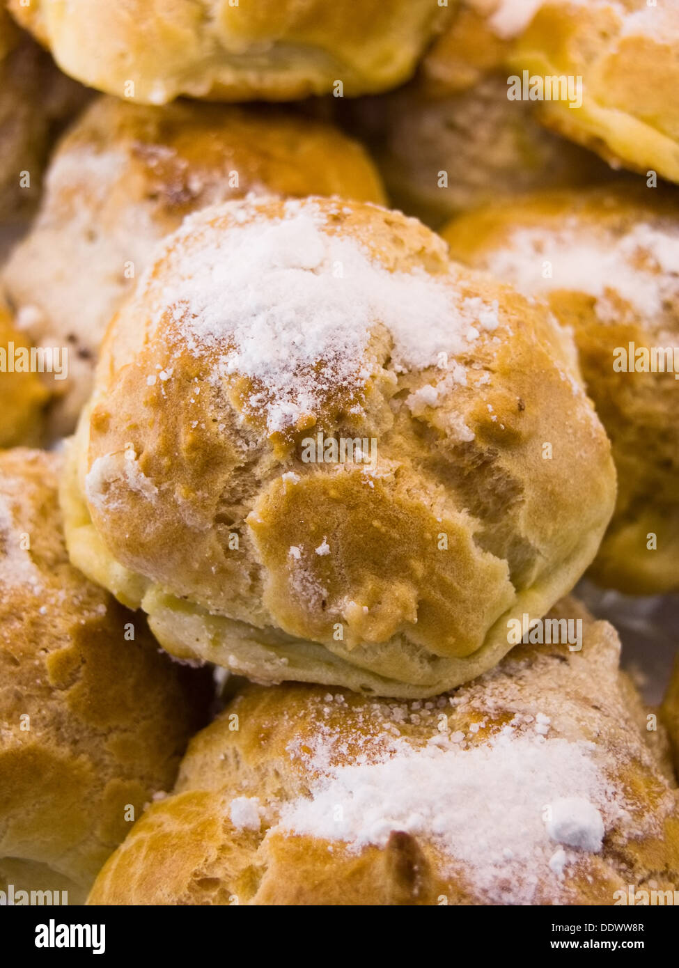 Sweet cream filled pastries powdered hi-res stock photography and ...