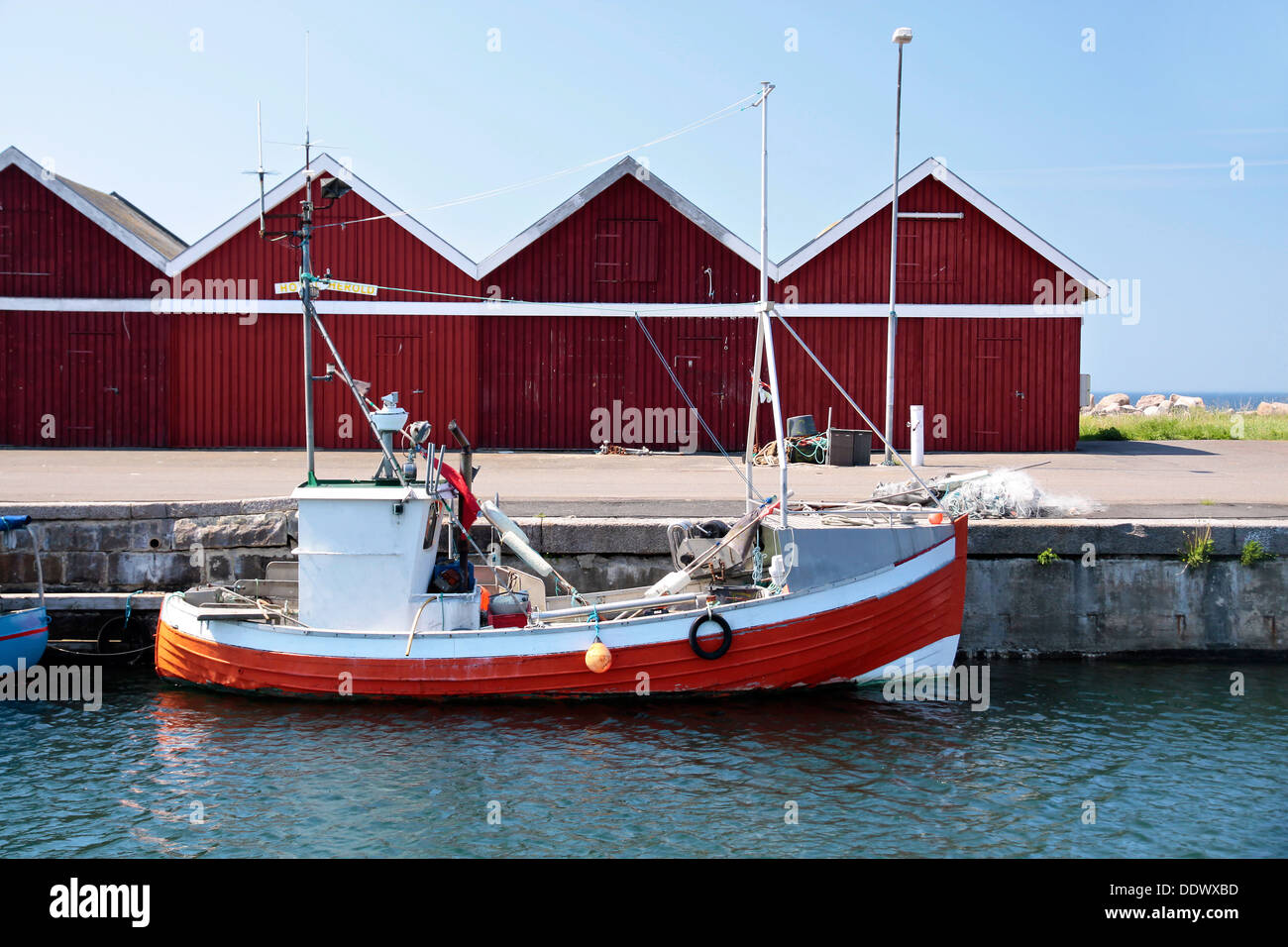 Small, red fishing boat in the port of Hasle Bornholm, Denmark Stock ...