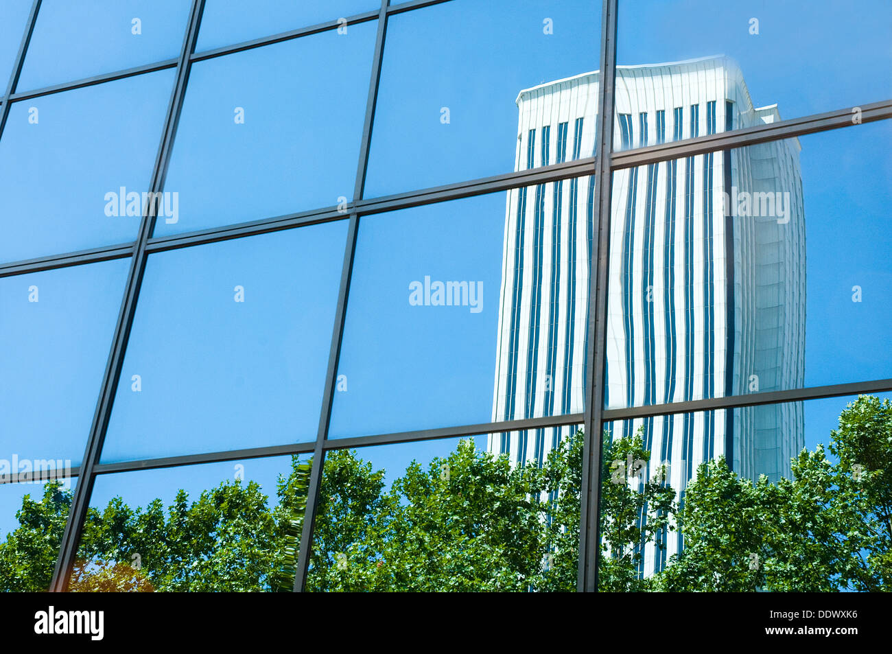 Picasso tower reflected on glass facade. AZCA, Madrid, Spain Stock ...