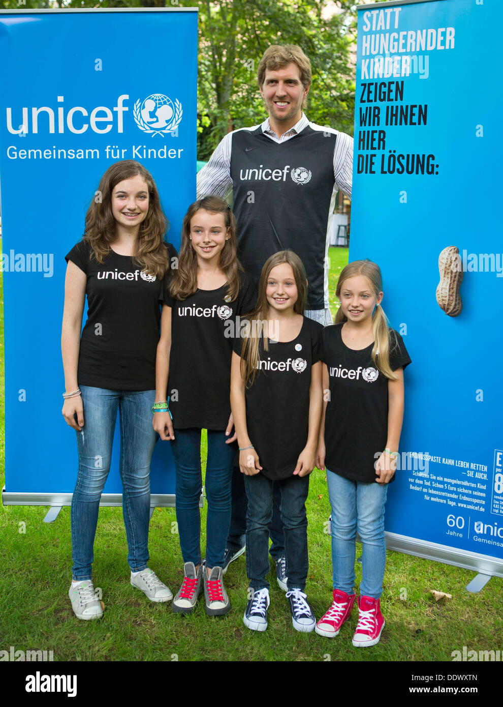 Basketball professional Dirk Nowitzki poses with the Junior ambassadors ...