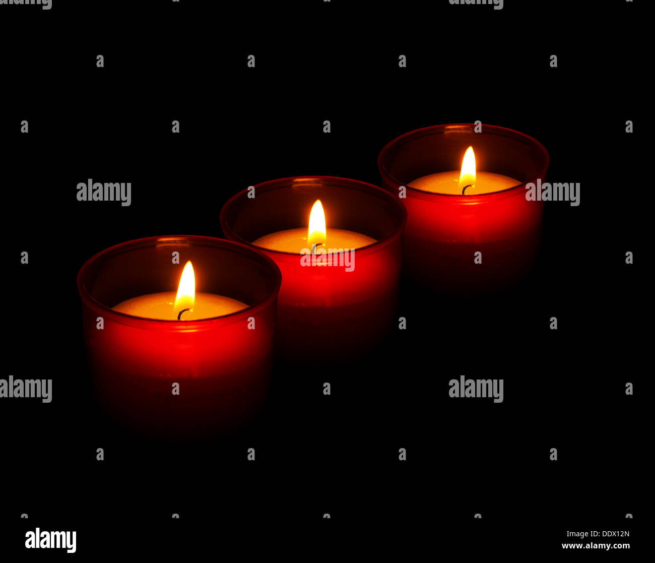 Red votive candles Stock Photo - Alamy