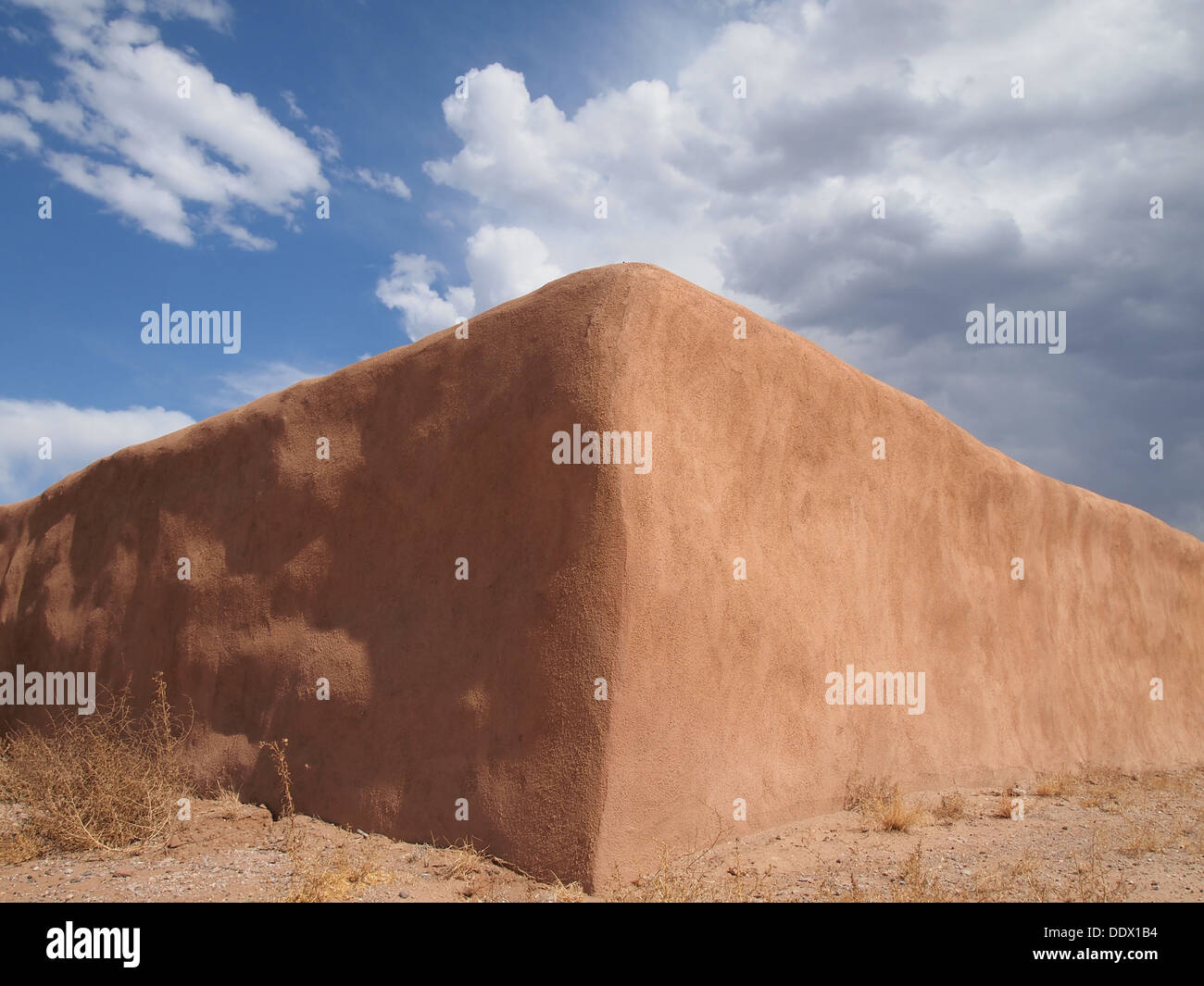 Adobe perimeter wall (to keep sand and dusty away from the buildings ...