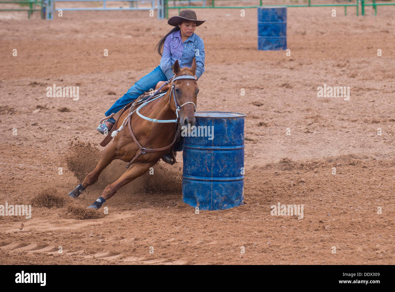 Cowgirl Participant in a Barrel racing competition at the 92nd annual ...