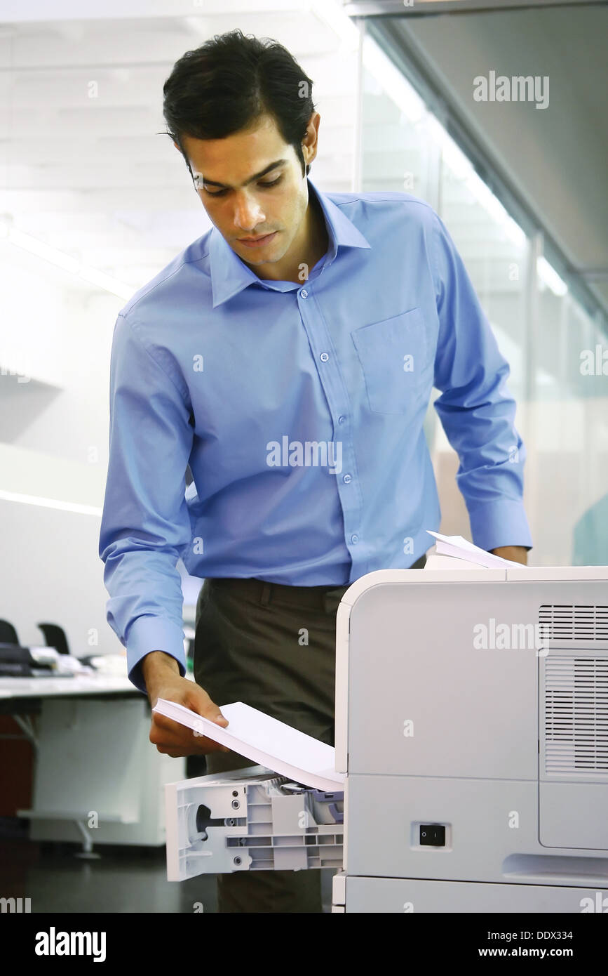 Hand man using fax machine hi-res stock photography and images - Alamy