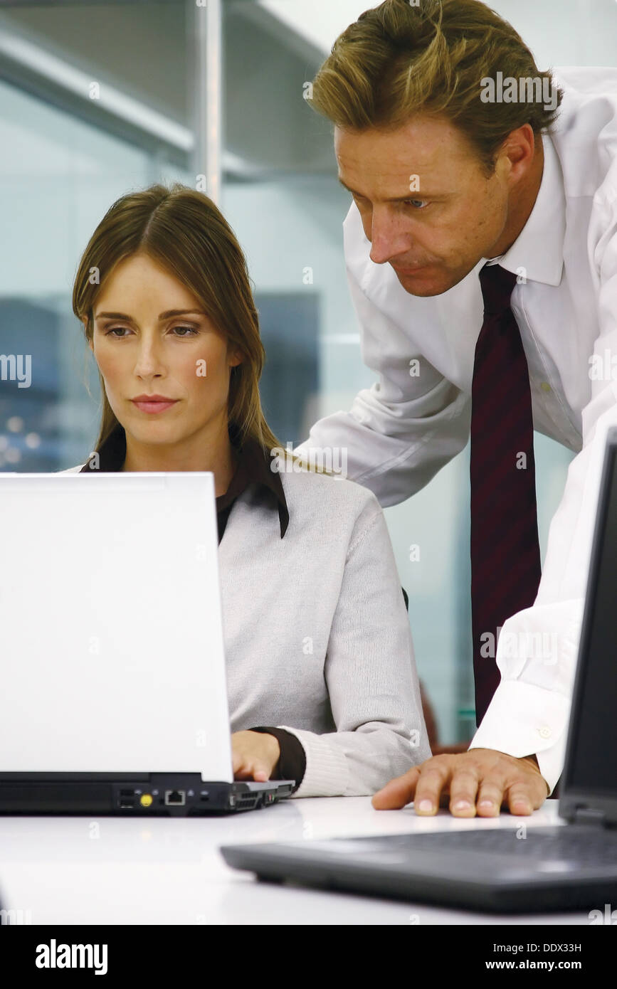 Business people in an office environment Stock Photo - Alamy
