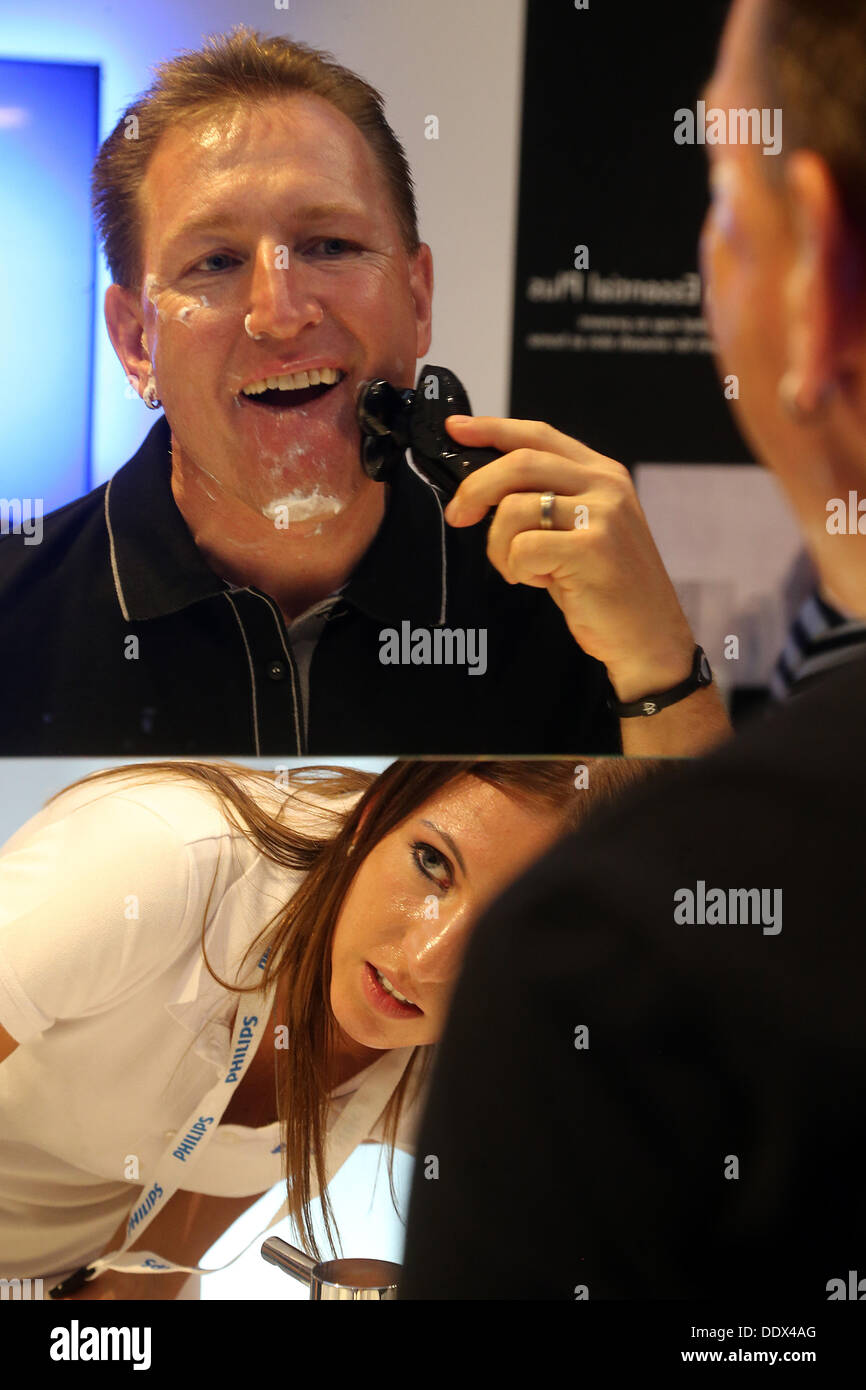 Berlin, Germany. 08th Sep, 2013. A man tests an electric shaver at the ...