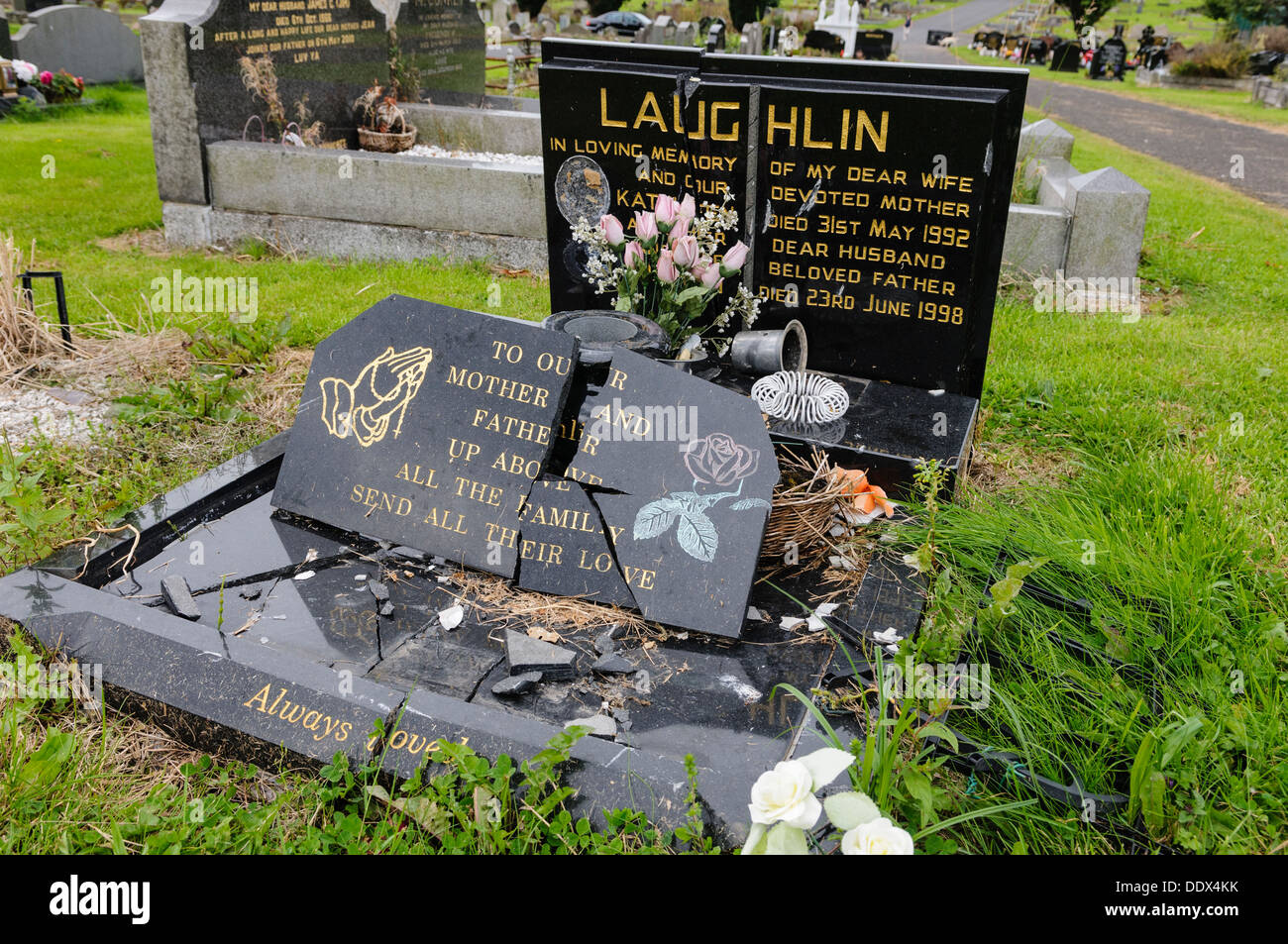 Broken gravestone in a cemetery after it has been vandalised Stock ...