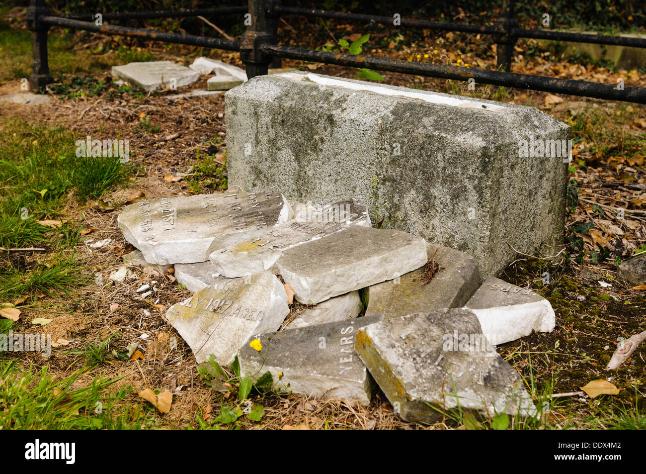 Broken gravestone in a cemetery after it has been vandalised Stock ...