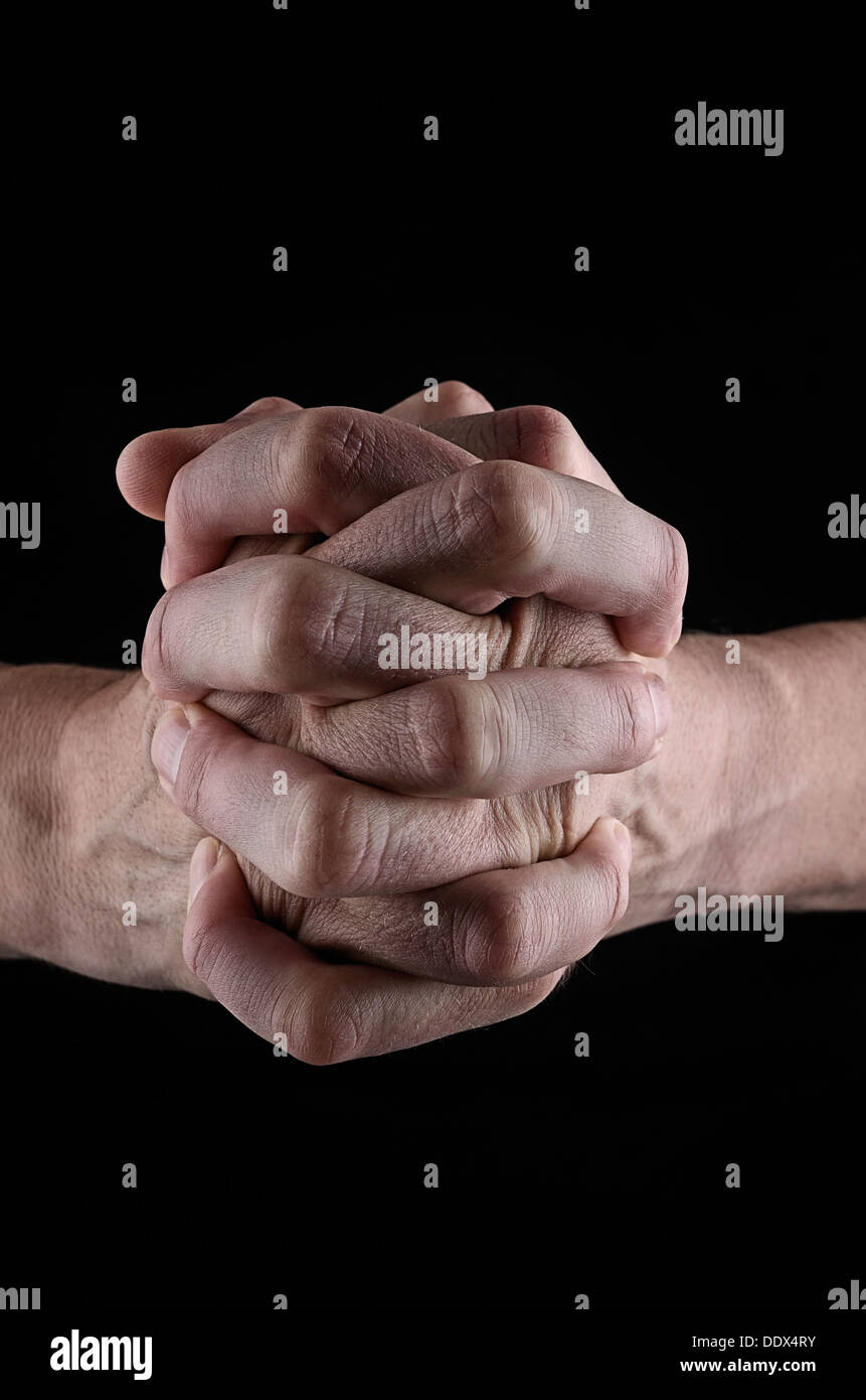 Praying hand hi-res stock photography and images - Alamy