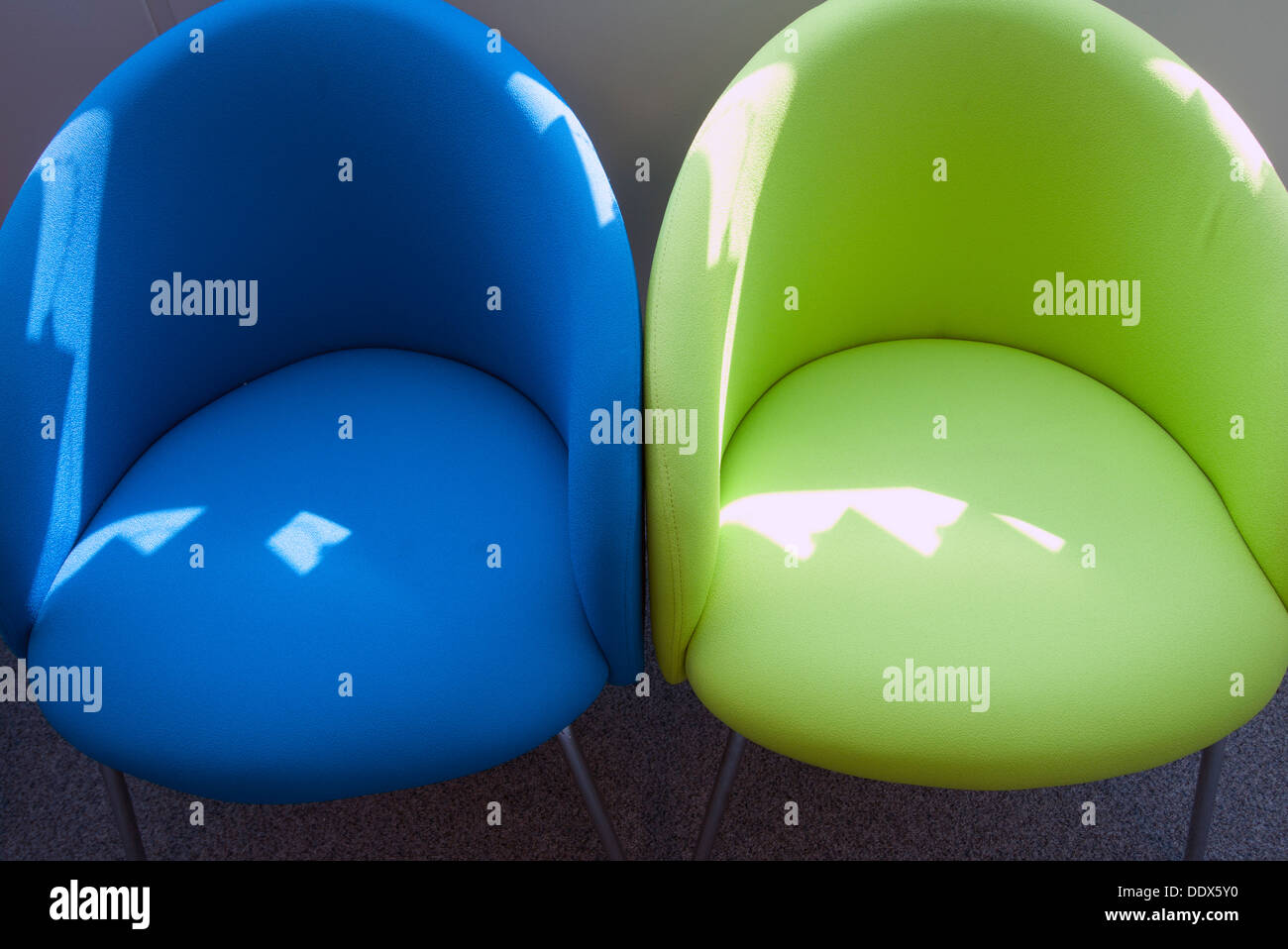 blue & green office chairs Stock Photo - Alamy