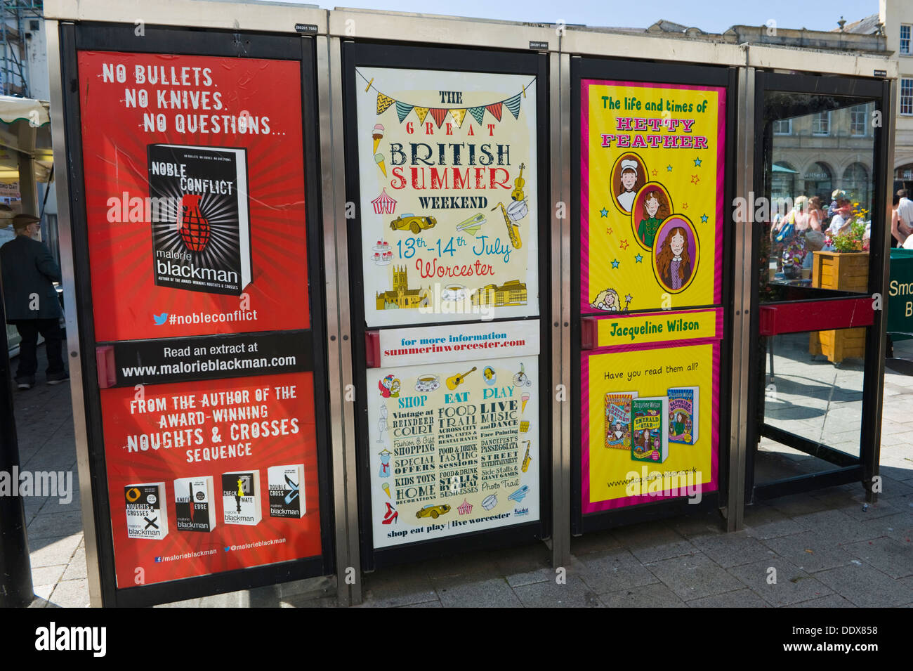 Phone boxes with advertising posters at High Town in Hereford ...