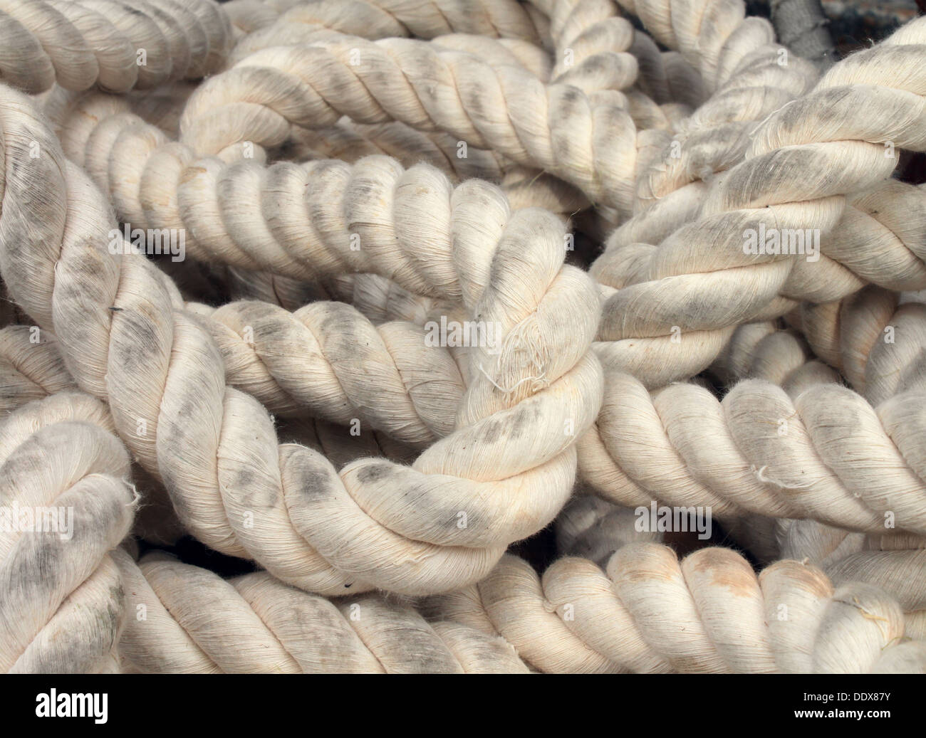 Marine rope as a life line concept for a boat or yacht in a tangled and ...