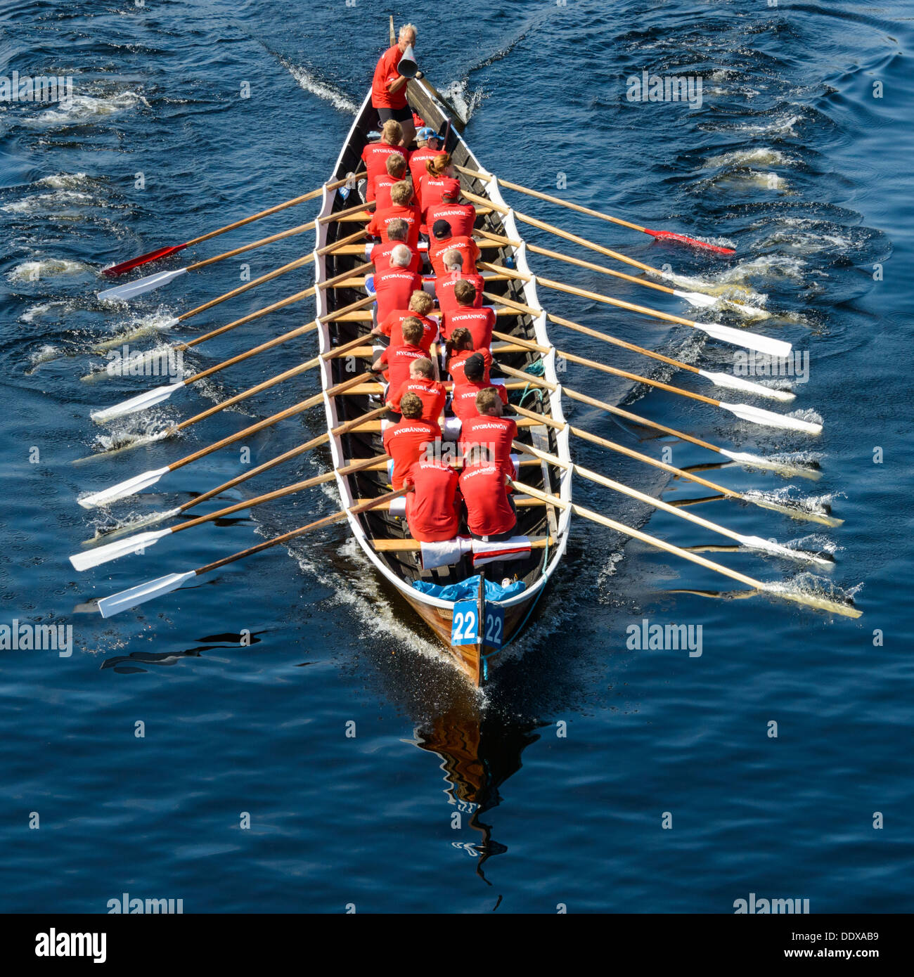 Large group rowing boats oars hi-res stock photography and images - Alamy