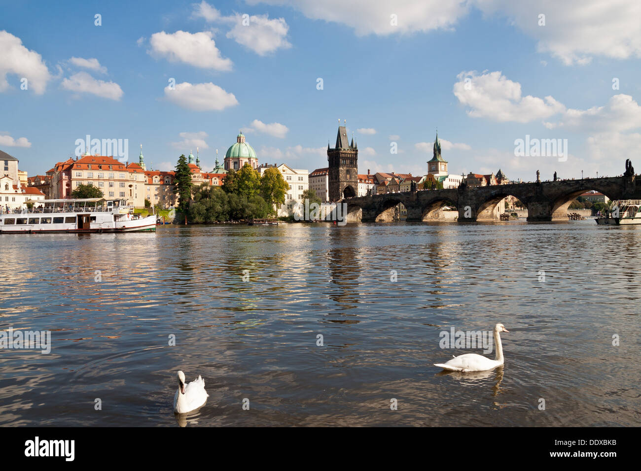 September in Prague, Vltava river and Charles bridge, sunny weather ...