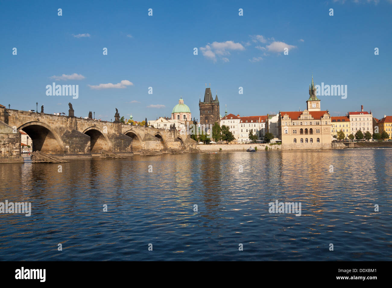 September in Prague, Vltava river and Charles bridge, sunny weather ...