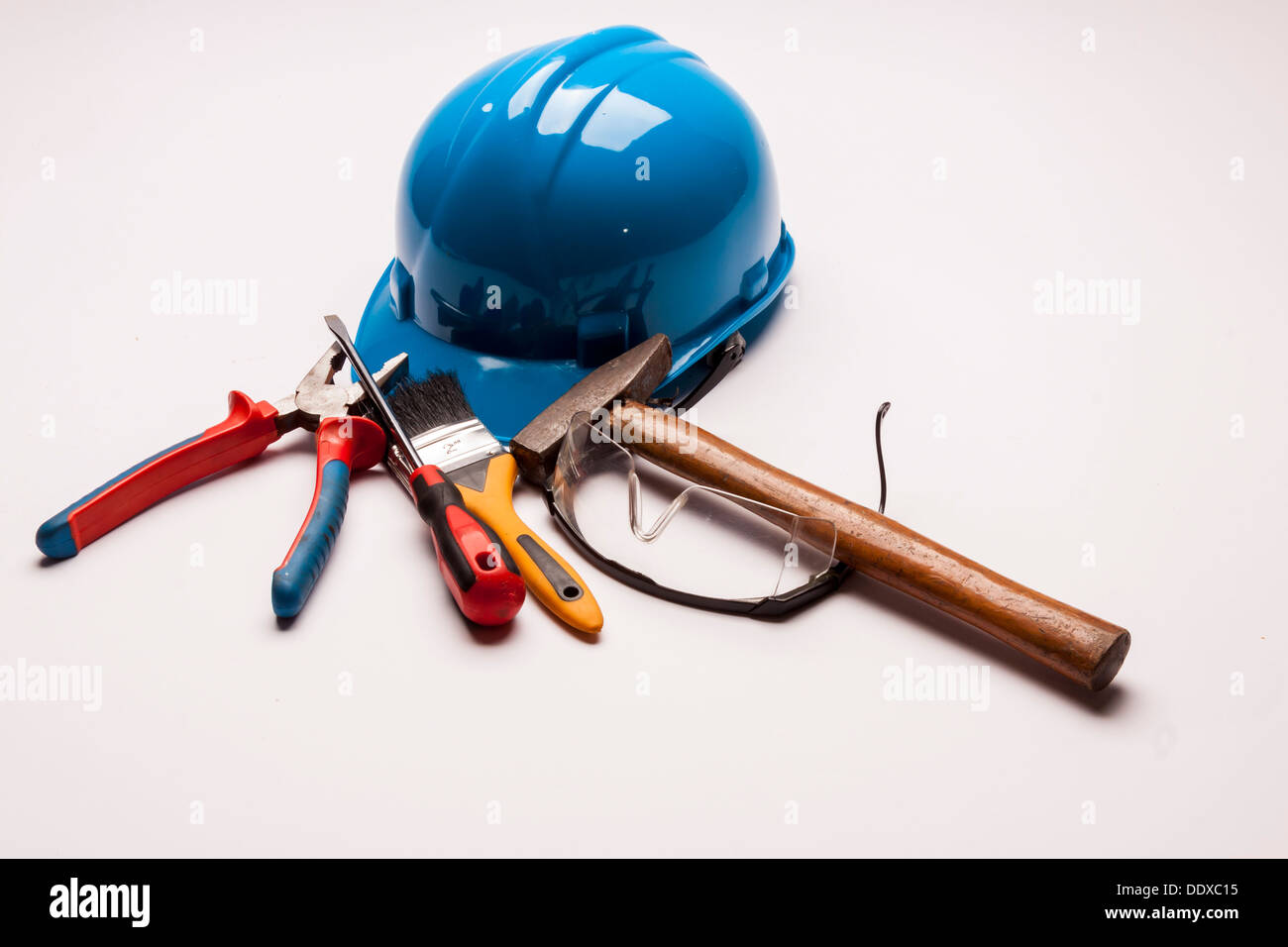 Workers tools on white background Stock Photo - Alamy