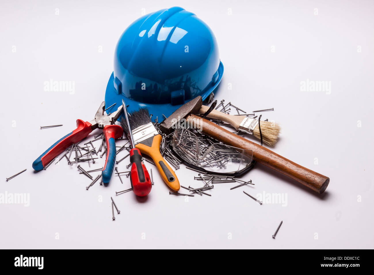 Workers tools on white background Stock Photo - Alamy
