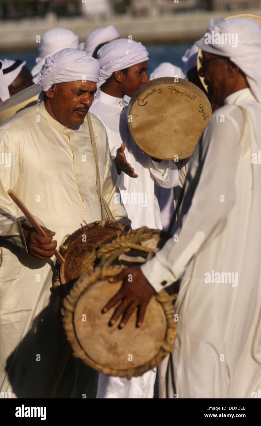 Men in traditional dance, Dubai, UAE Stock Photo - Alamy
