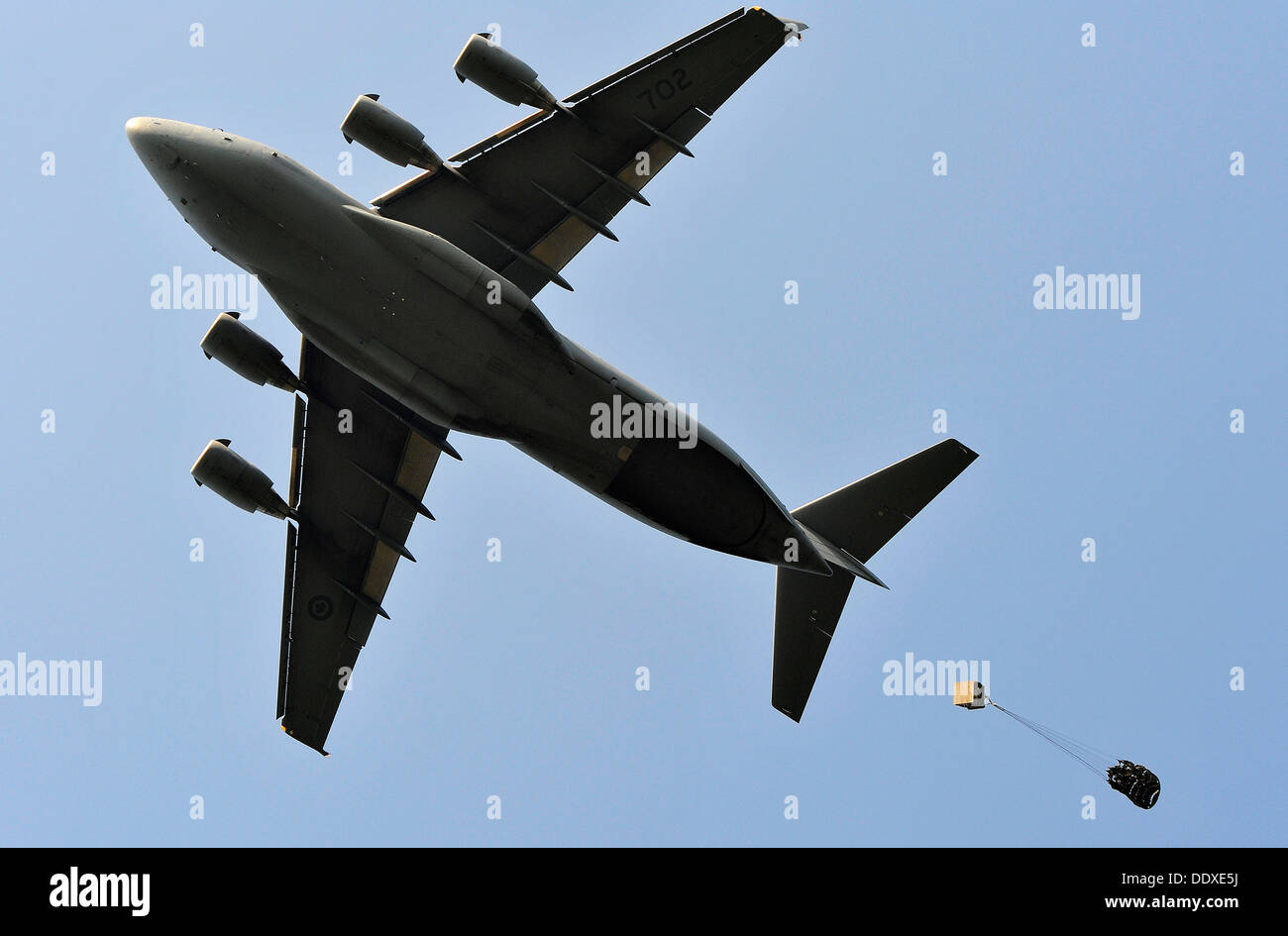 A Royal Canadian Air Force C-17 Globemaster III cargo aircraft drops a ...