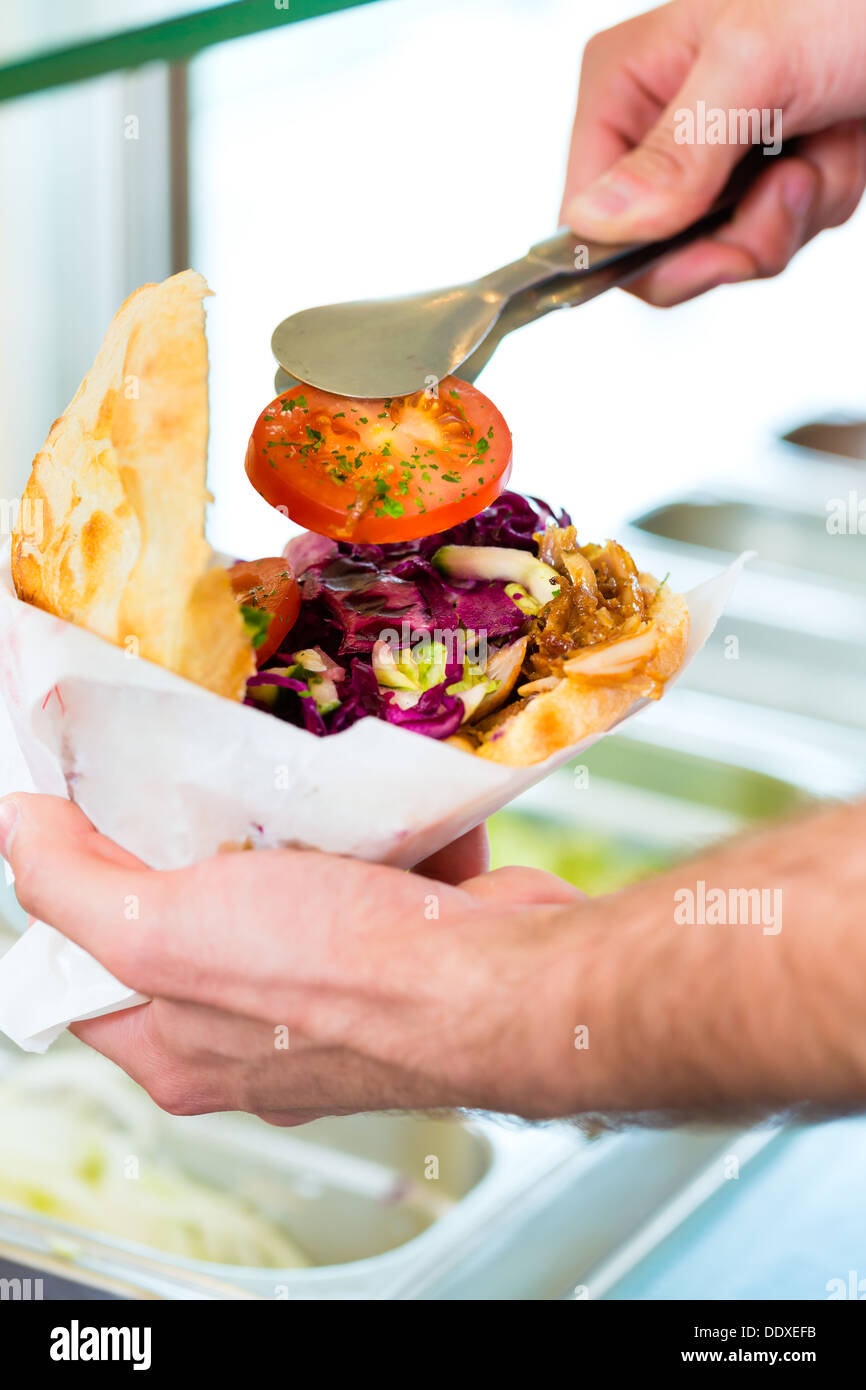 Man eating doner kebab hi-res stock photography and images - Alamy
