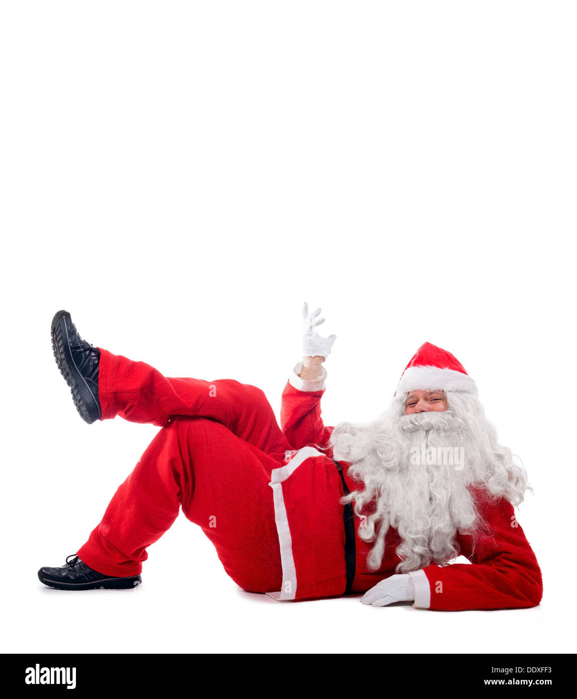 Santa Claus lying on white background Stock Photo - Alamy