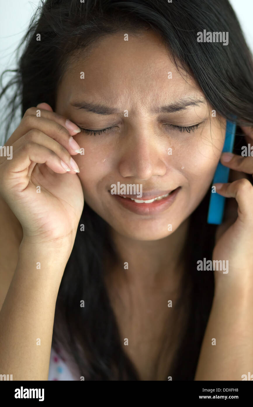 One sad woman phone crying hi-res stock photography and images - Alamy