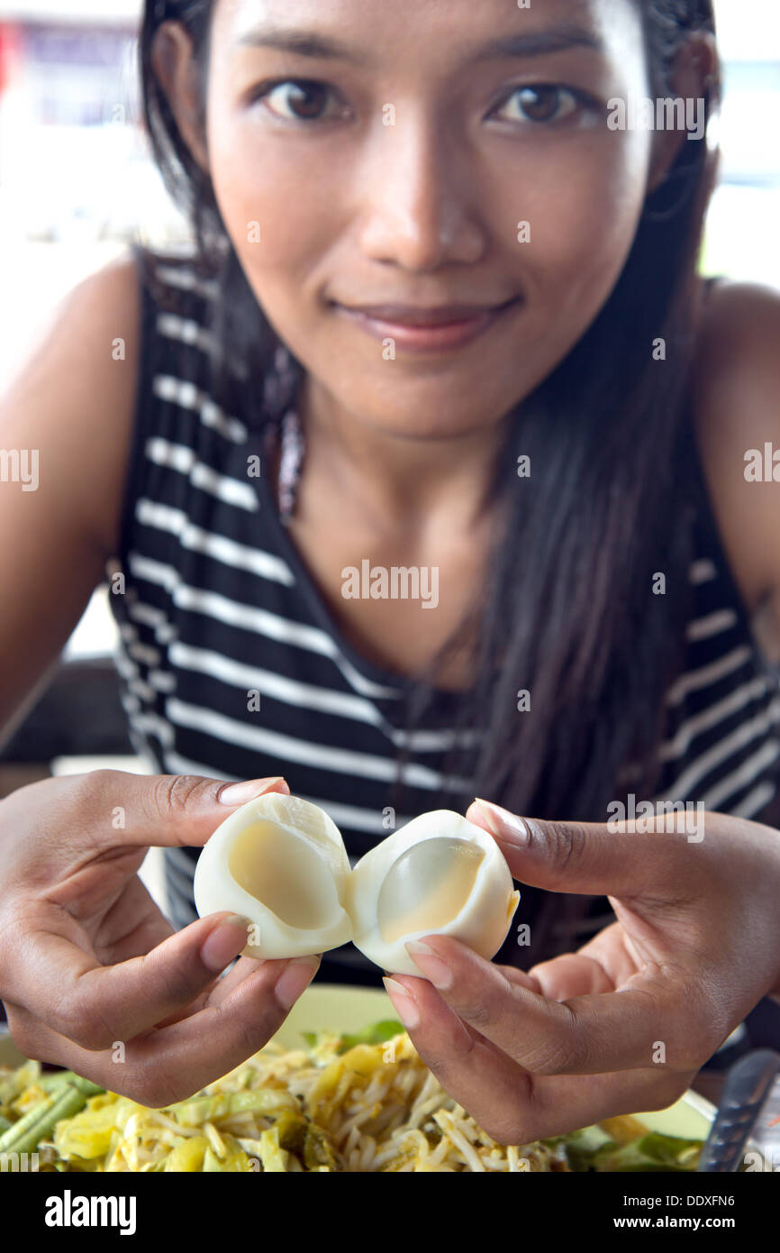 Beautiful woman eating curry hi-res stock photography and images - Alamy