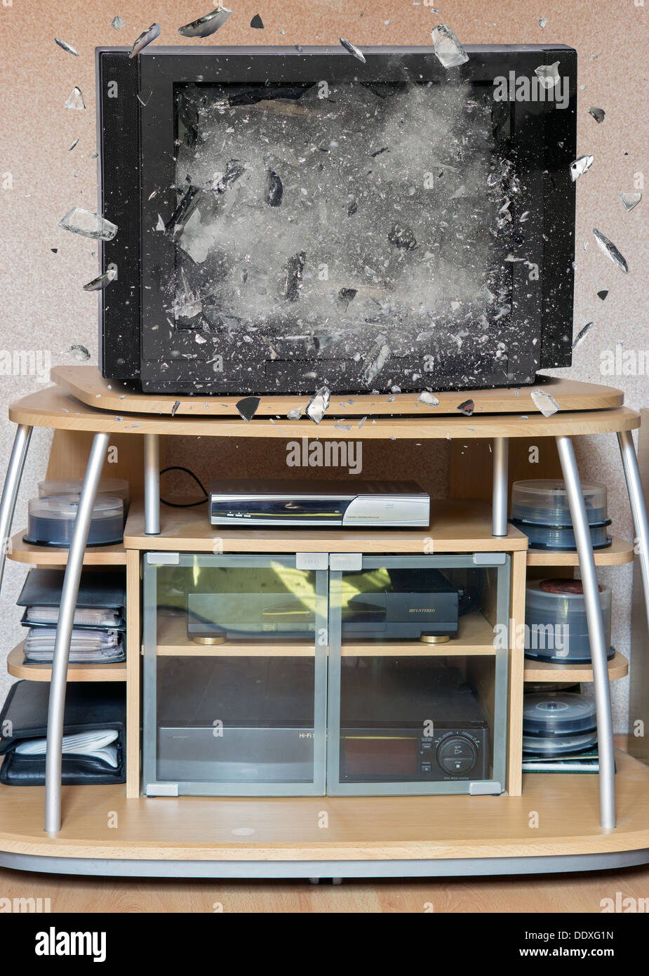 Explosion of TV in the room Stock Photo - Alamy