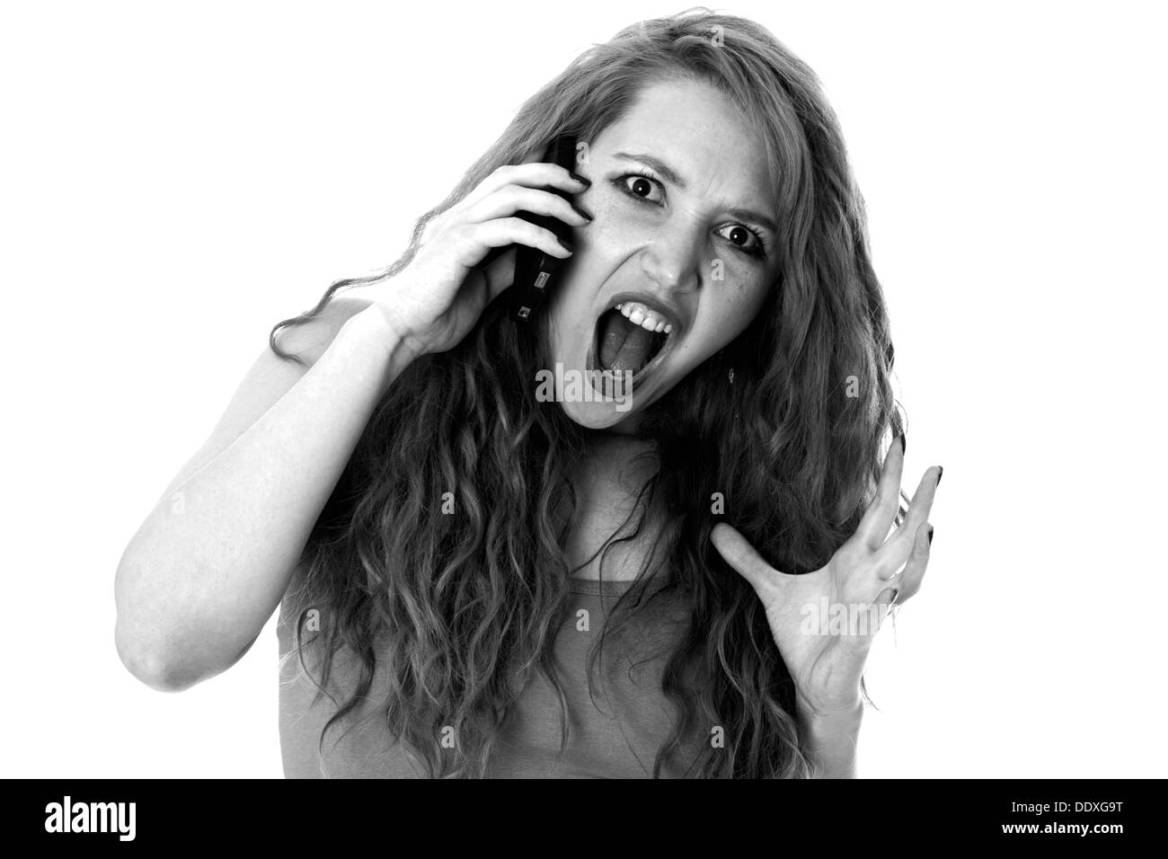 Angry young woman screaming isolated Black and White Stock Photos ...