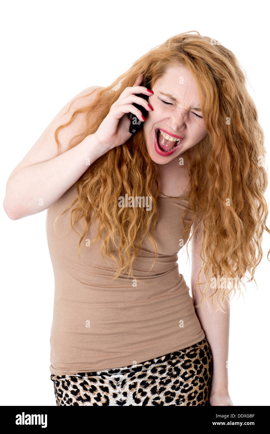 Model Released. Angry Young Woman Using Mobile Telephone Stock Photo ...