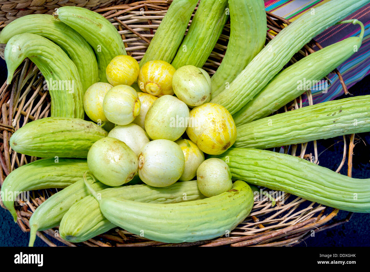 Green and yellow vegetables in a basket Stock Photo - Alamy