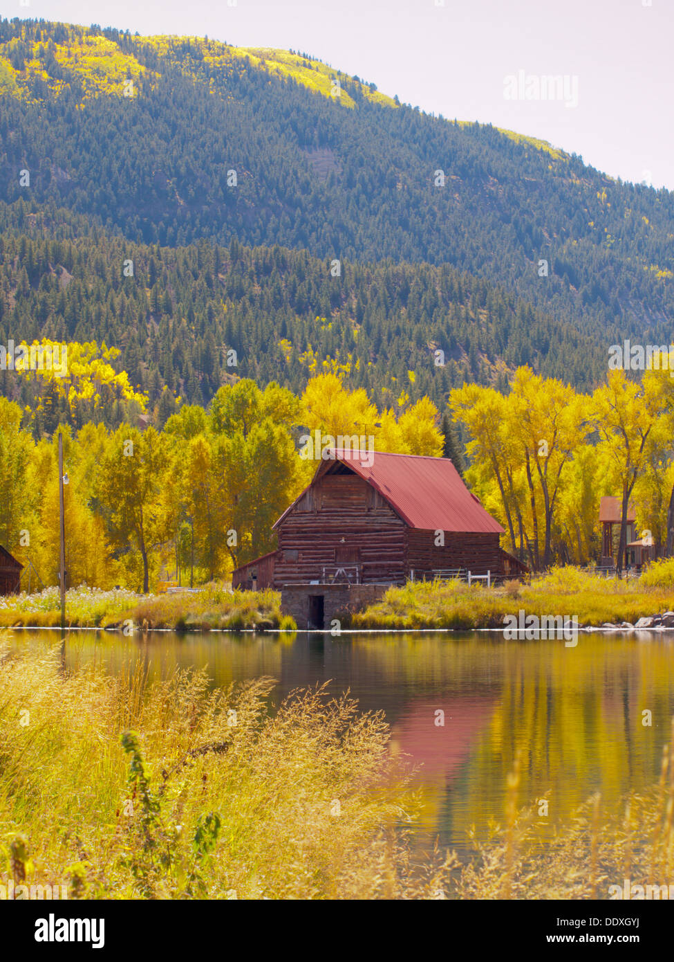 Old barn by the lake in autumn. Near Lake City, Colorado Stock Photo ...