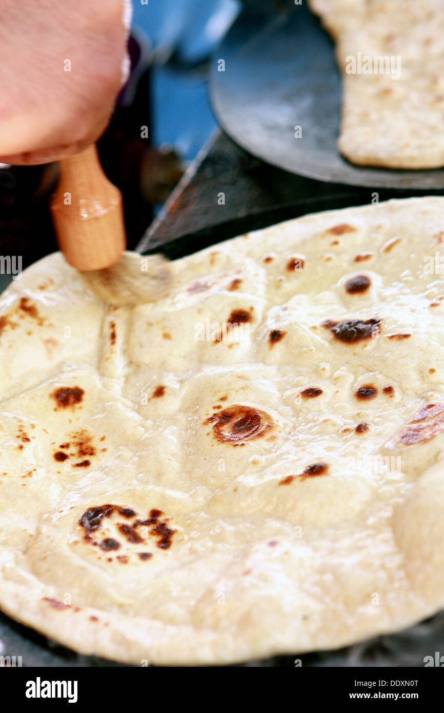Cooking the roti hi-res stock photography and images - Alamy