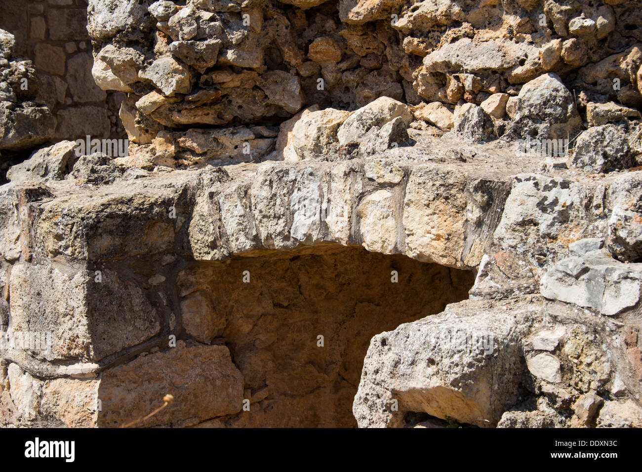 An arched doorway in the ruins of the city of Aptera in northern Crete ...