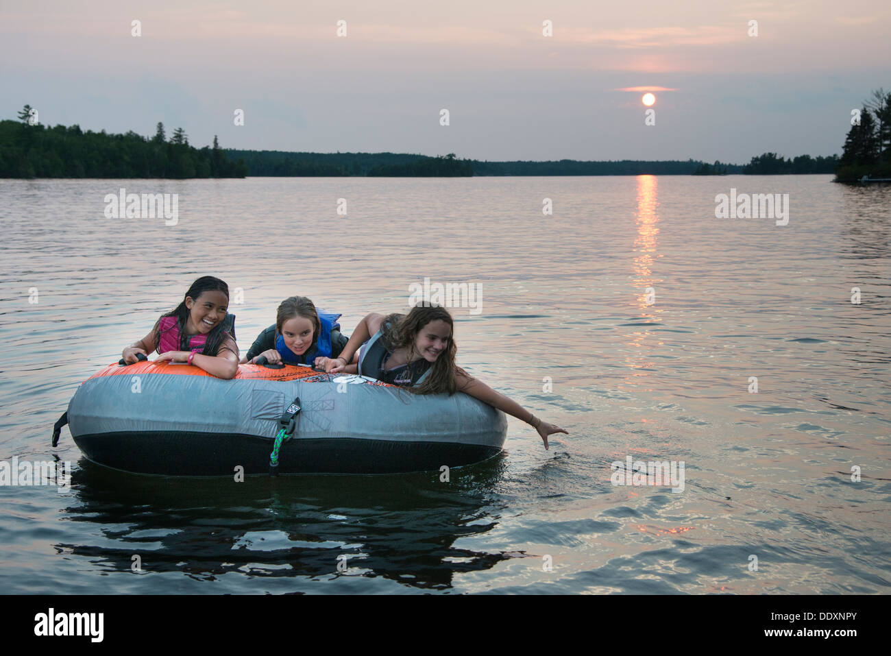 Girls in raft hi-res stock photography and images - Alamy