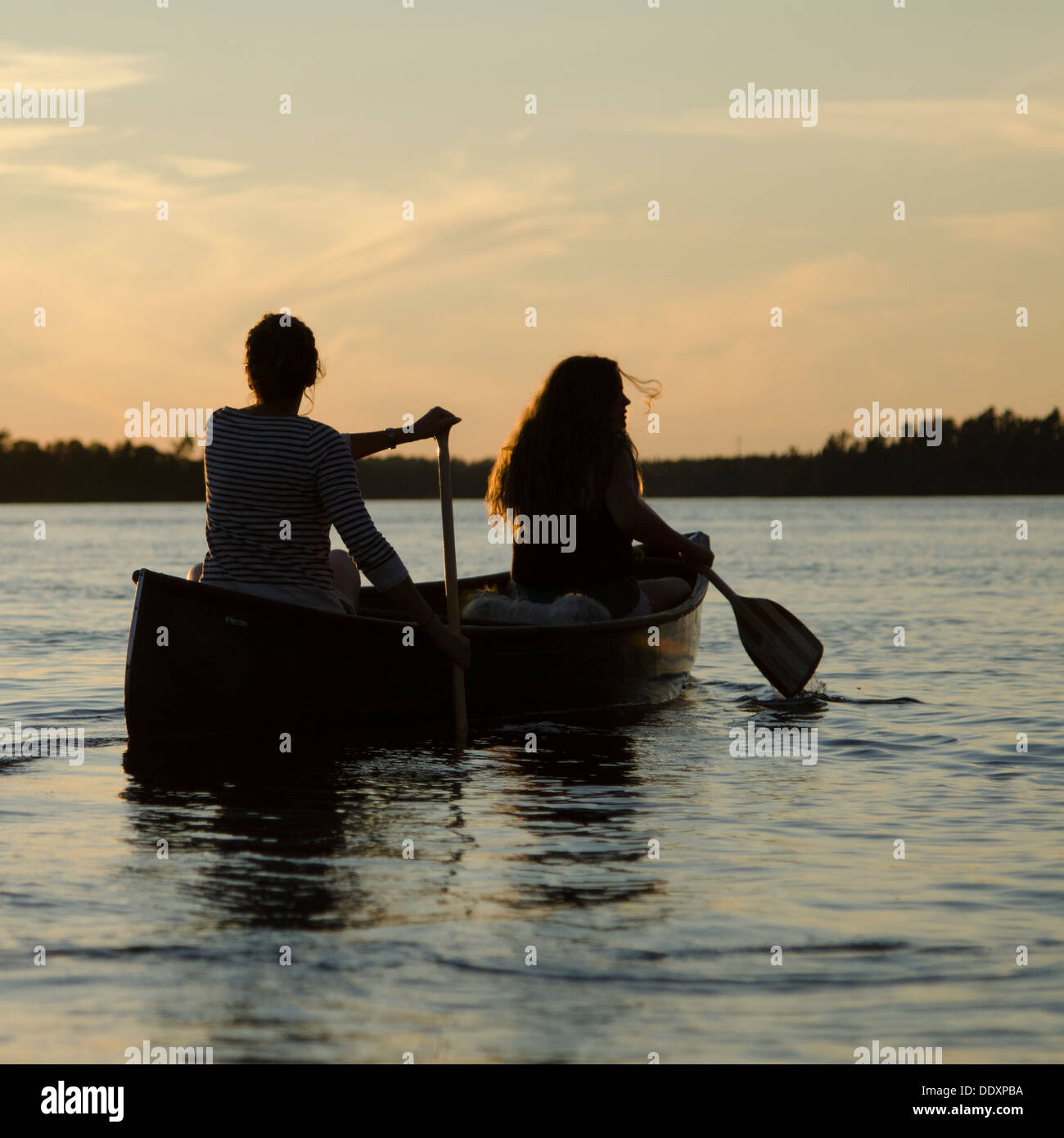 Woman rowing boat silhouette hi-res stock photography and images - Alamy