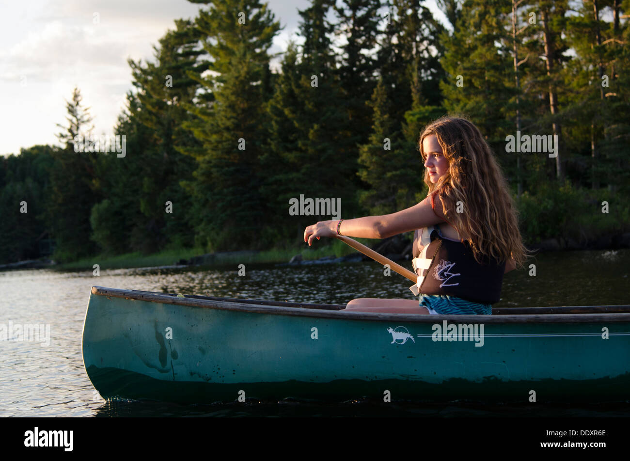 Girl rowing lake of the woods hi-res stock photography and images - Alamy